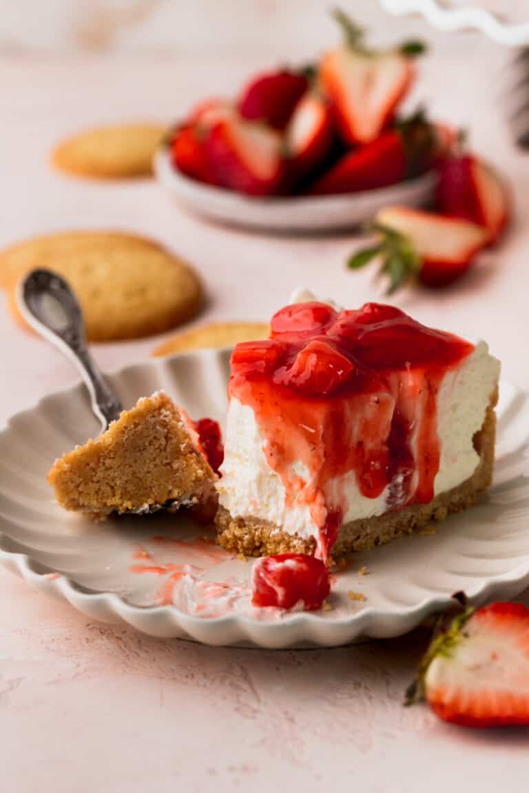 Lemon Cheesecake with Strawberry Sauce - Stephanie's Sweet Treats